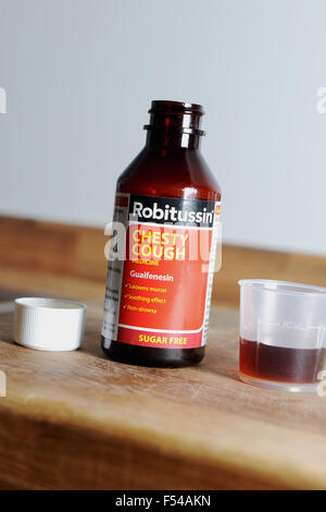 Robitussin cough medicine linctus for a chesty cough Stock Photo - Alamy
