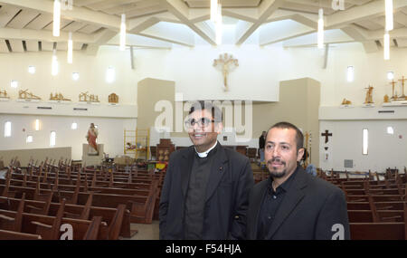 Usa. 26th Oct, 2015. LIVING -- Father Jerry Plotkowski, left, and The ...