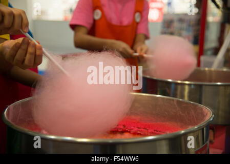 Making cotton candy Stock Photo - Alamy