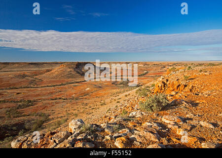 Aerial view of mesa or flat topped ridge in mountains with steep slopes ...