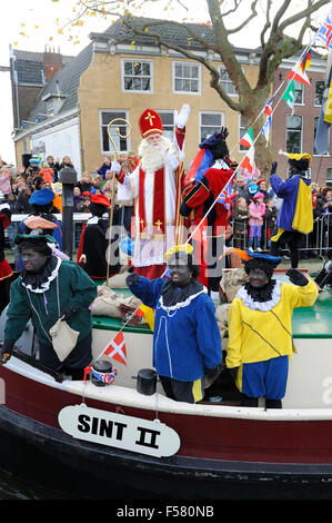 Santa Claus arrives on a boat from Spain in Holland.This is a typical ...