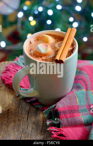 Hot drink with marshmallows on table Stock Photo - Alamy