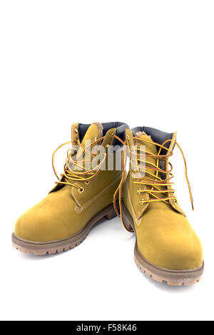 A pair of yellow leather boots isolated on a white background Stock ...