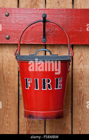 Fire Safety Sand Bucket hanging against white background Stock Photo ...