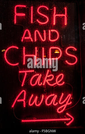 Fish & Chips Neon Sign on a Dark Wooden Wall Stock Photo - Alamy