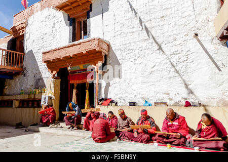 Buddhist monks reading religious scrolls at the courtyard of the Hanle ...