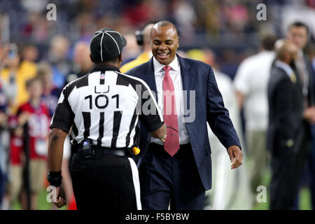 NFL line judge Carl Johnson stands on the field during an NFL football ...