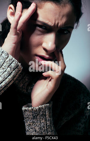 young pretty teenage woman emotional posing on pink background Stock ...