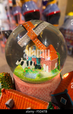 Windmill tourist souvenirs for sale in the window of a gift shop in ...