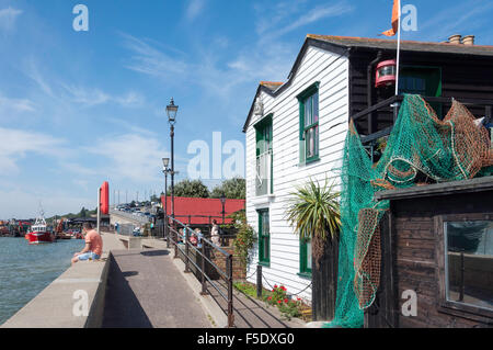 The historic town of Leigh On Sea seen from the west while the tide ...