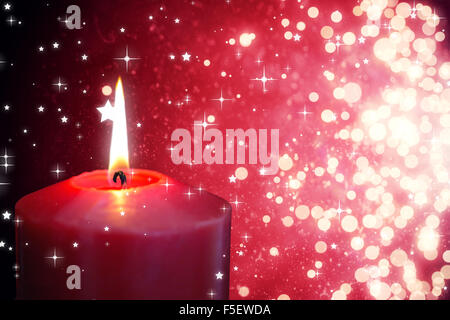 Composite image of red candle Stock Photo - Alamy