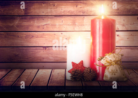 Composite image of christmas candles Stock Photo - Alamy