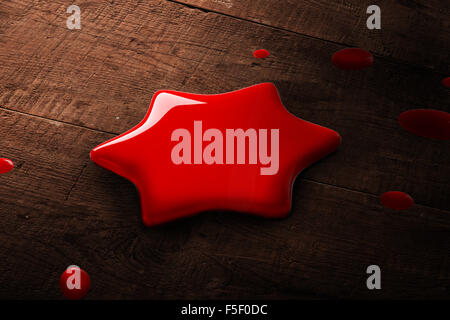 A red star paint splash Stock Photo - Alamy