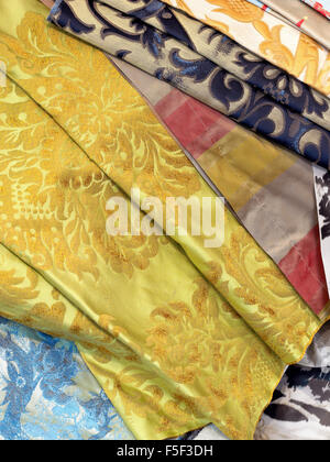 Rolled up satin in a fabric shop Stock Photo - Alamy