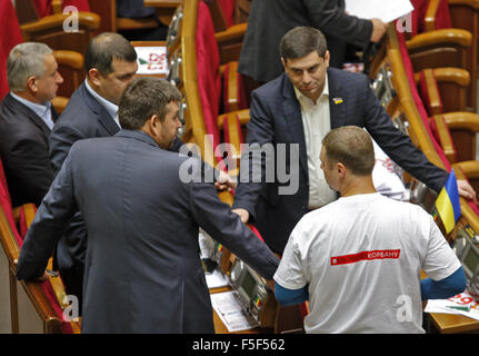 Kiev, Ukraine. 3rd Nov, 2015. A woman holds the photo of the leader ...