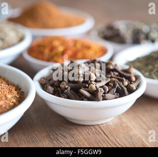 various spices on wooden table Stock Photo - Alamy