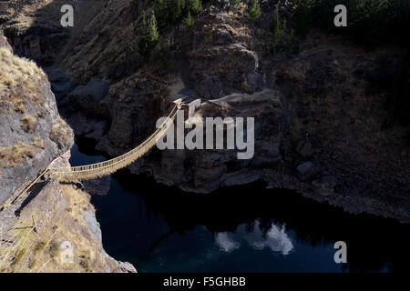 Last useable Inca hanging bridge, rope bridge made of braided Peruvian ...