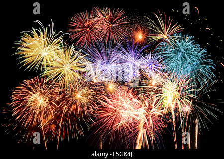 Fireworks of different colors with the black background Stock Photo - Alamy