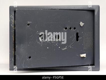 A small home safe broken open Stock Photo - Alamy