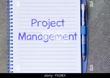Project Management Process text on white sketchbook with color pen, top ...