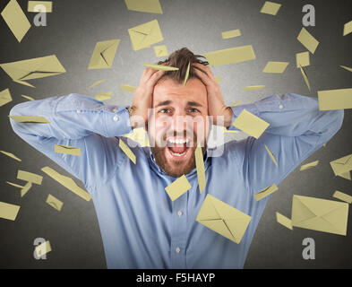 Scared by too many email Stock Photo - Alamy