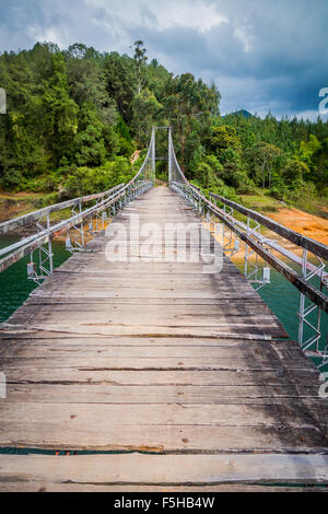 Wooden suspension bridge in Guatape, Colombia Stock Photo - Alamy