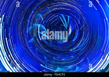Abstract background of light trails with circular rotation, which was ...
