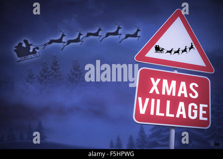 Composite image of christmas road sign Stock Photo - Alamy