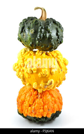 three Halloween pumpkins on green grass, horizontal photo Stock Photo ...