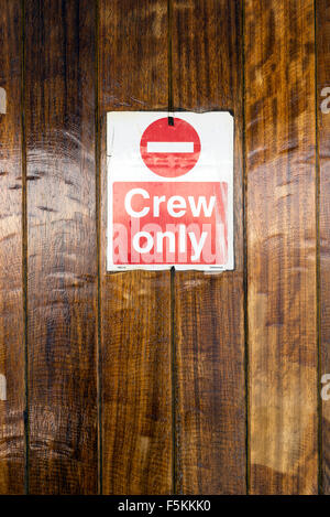 Crew Only sign Stock Photo - Alamy