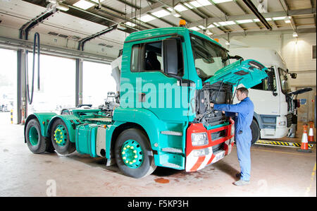 repairing a cab lorry in a garage workshop Stock Photo - Alamy