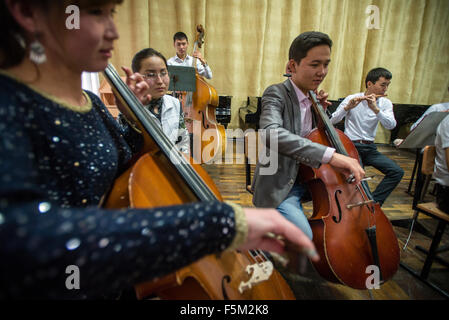 Kyrgyz authentic musical instruments orchestra play with conductor ...