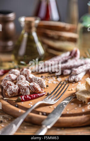 Dry salami mini sausage snack appetizer Stock Photo - Alamy