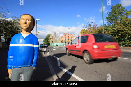 A life-like 'child bollard' on a pavement close to a school crossing ...