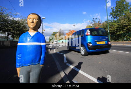 A life-like 'child bollard' on a pavement close to a school crossing ...