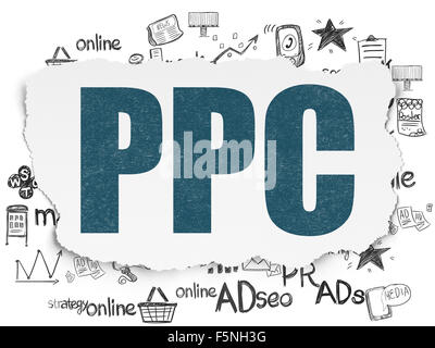 Marketing concept: PPC on Torn Paper background Stock Photo - Alamy