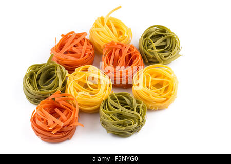 colour roll nest pasta on a white background Stock Photo - Alamy