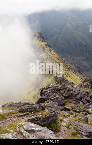 Beenkeragh or Binn Chaorach ridge to Carrauntoohil with hikers in ...