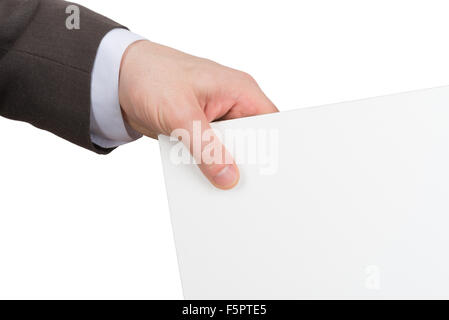 Businessmans hand holding edge of empty paper Stock Photo - Alamy