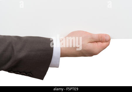 Mans hand holding edge of blank paper Stock Photo - Alamy