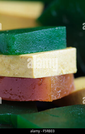 Slices of "ate", a fruit paste candy traditional to Morelia, Michoacan ...