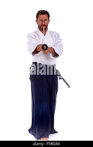 Portrait of aikido sensei master with black sensei belt in taekwondo ...