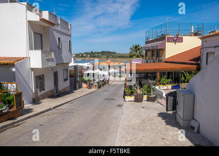A street in the town of Alvor in the Algarve with bunting hanging Stock ...