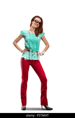 Young woman standing over isolated background praying with hands ...