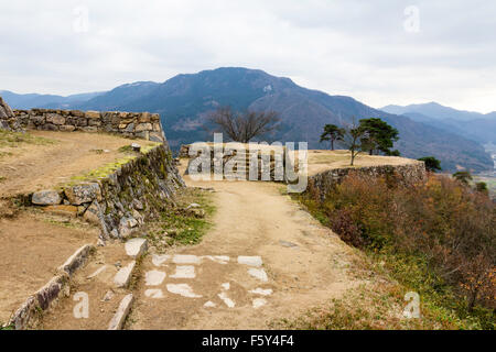 Japan, Takeda mountain top castle. Foundations and walls of the ruined ...