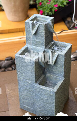 A home made water fountain in the shape of a rose Stock Photo - Alamy