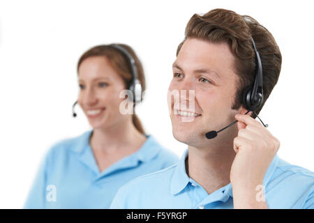 Staff Answering Calls In Customer Service Department Stock Photo - Alamy
