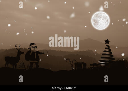 Composite image of christmas scene silhouette Stock Photo - Alamy