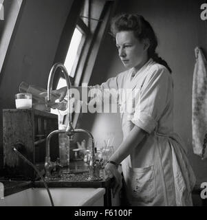 1950s, historical, young adult science undergraduates using microscopes ...