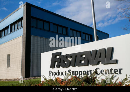 A logo sign outside of the headquarters of the Fastenal Company in ...